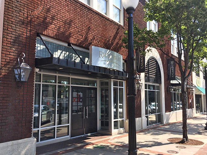 That brick facade on Main Street means serious business – the kind that involves perfectly aged steaks and memorable evenings.