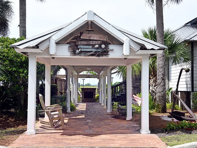 Skipper's elegant white columns lead to brick pathways and waterfront views – Southern charm meets fresh-caught delights.