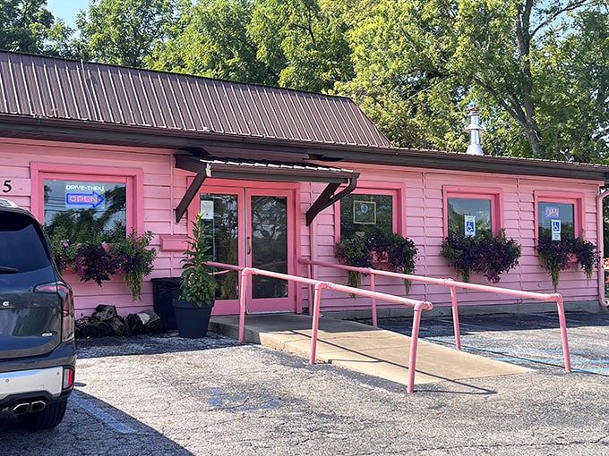 Hot pink exterior that's impossible to miss - confidence like this only comes from knowing your ribs can back up the bold statement.