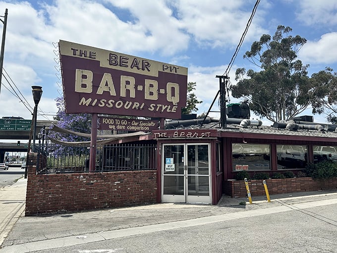 That vintage sign has been calling BBQ lovers home for decades – and the burnt ends prove why.