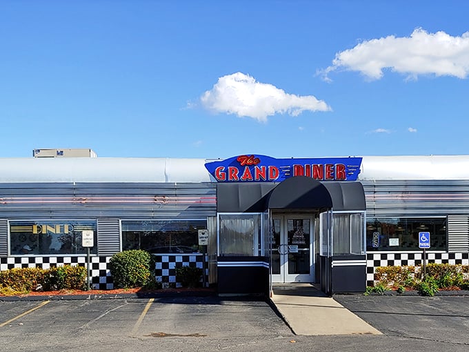 The Grand Diner's classic chrome and checkered exterior—where 1950s nostalgia meets 21st-century appetite satisfaction.