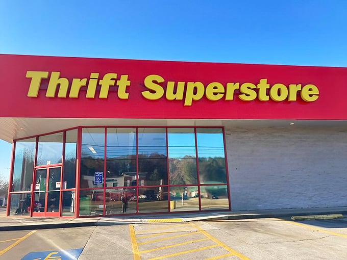 The Thrift Superstore's bold red and yellow facade shouts "BARGAINS INSIDE!" louder than any carnival barker ever could.