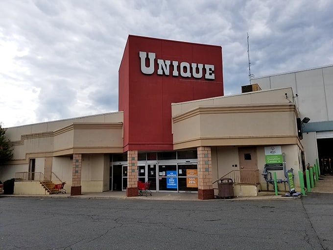 Unique lives up to its name with that bold red sign standing tall like a thrift store lighthouse.