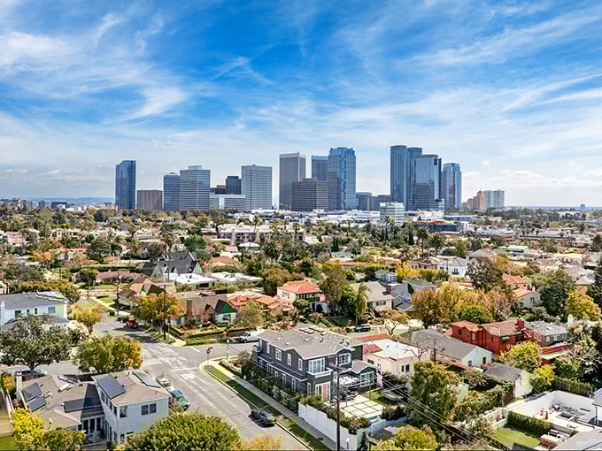 This sprawling cityscape shows how urban neighborhoods blend seamlessly with towering downtown skylines in modern California.