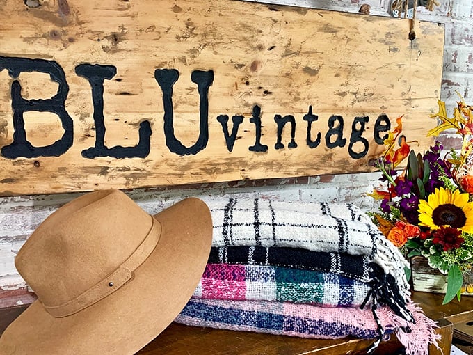 That wooden sign, tan hat, and colorful blanket aren't just decor—they're a preview of how vintage can feel completely fresh and relevant.