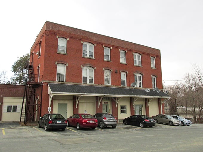 This brick behemoth in Brooklyn whispers tales of industrial heritage – now offering apartments at prices that would make your Depression-era grandparents proud.