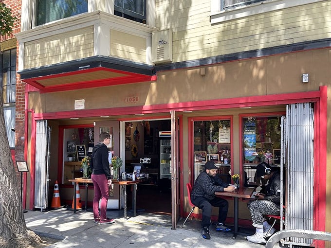 The bright red awning acts like a beacon for sandwich seekers navigating San Francisco's bustling streets.