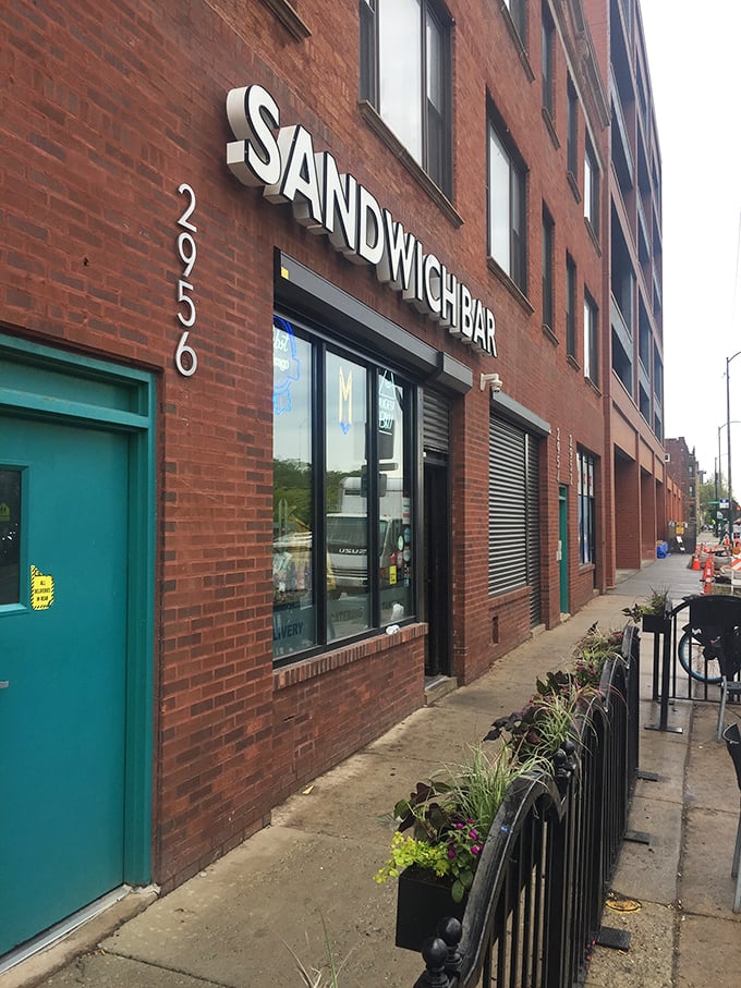 The simple "Sandwich Bar" sign tells you everything you need to know – no gimmicks, just incredible sandwiches inside.