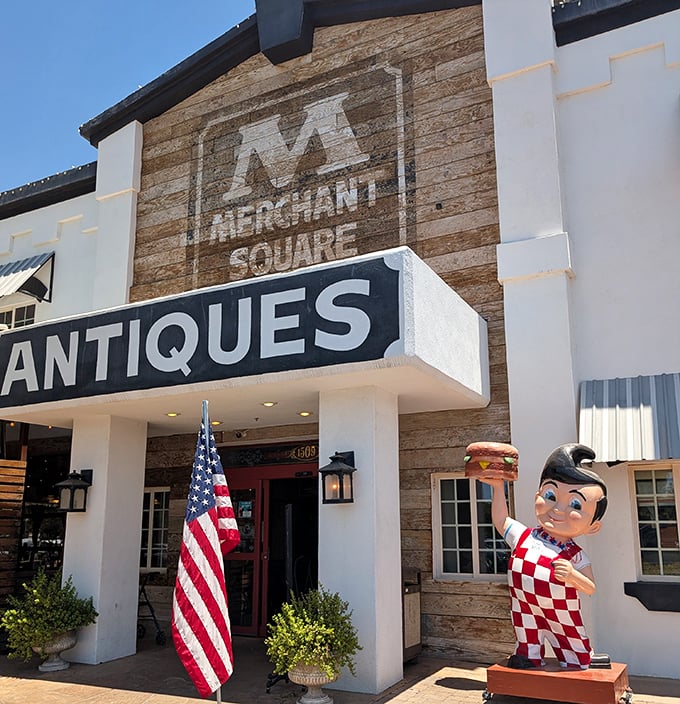 That cheerful mascot and patriotic flag create an irresistible invitation to explore history one booth at a time.