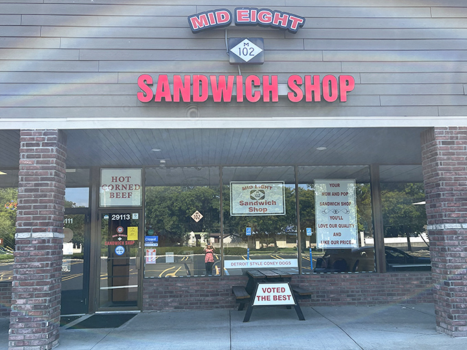 The bold red sign says it all – no fancy frills, just sandwiches that have earned their "Voted The Best" sign.