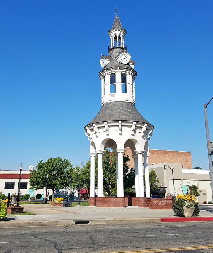 The towering plaza centerpiece watches over a community where neighbors still know each other.