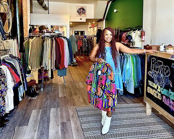 Inside Retro Rewind, colorful vintage pieces pop against wooden floors, each rack a rainbow of fashion history.