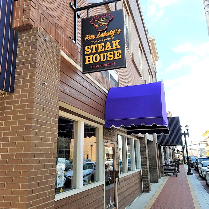 The "Trust Your Butcher" promise on this charming storefront means you're in for some seriously good meat.
