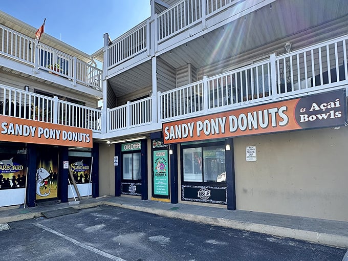 Sandy feet welcome! This beachside Sandy Pony location understands the donut-to-beach pipeline perfectly.