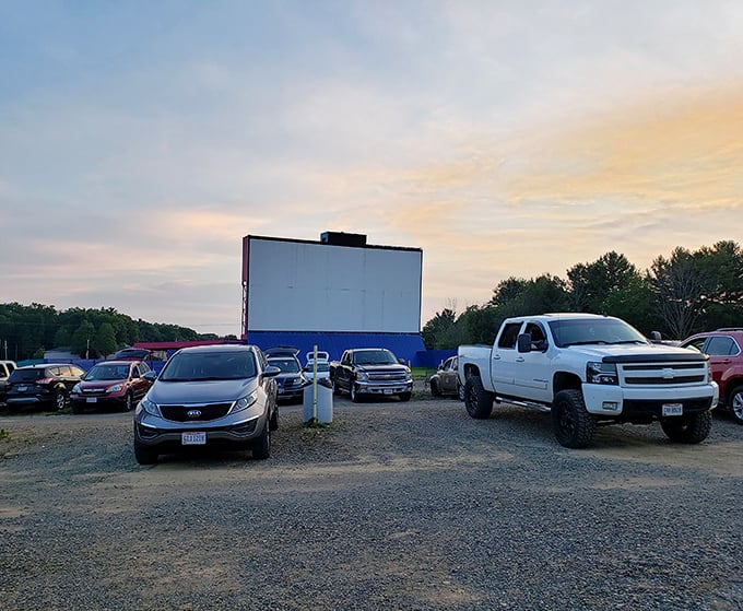 That blue and pink facade promises retro charm where classic drive-in magic never fades.