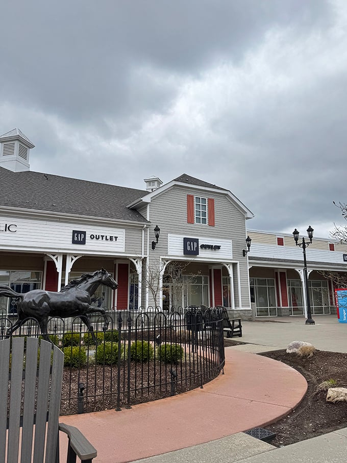 Wide pathways and thoughtful landscaping prove that outlet shopping can be both profitable and pleasantly civilized.