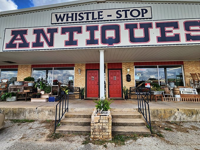Twin red doors welcome you to this charming roadside attraction. The weathered porch displays are just appetizers for the feast of finds inside!