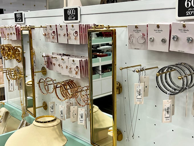 Kate Spade's jewelry display—where "just browsing" transforms into "I definitely need those earrings" faster than you can say "60% off retail."