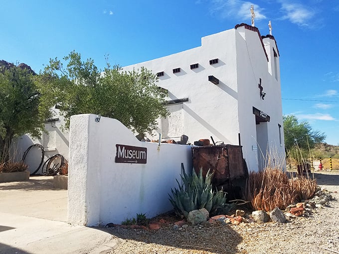 The Ajo Historical Society Museum wears its desert garden like a carefully chosen accessory—southwestern minimalism that HGTV hosts would approve of.