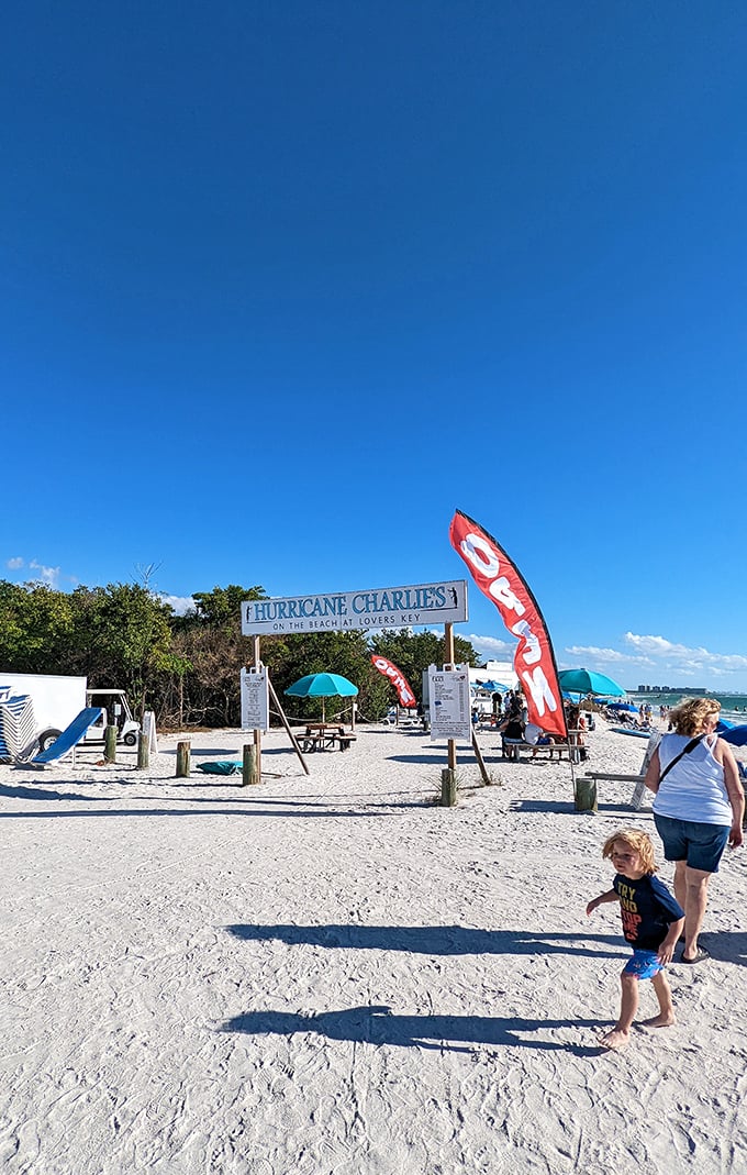 Hurricane Charlie's beach stand – proof that even after storms, Florida finds a way to bounce back with umbrellas, snacks, and that unbeatable Gulf view.