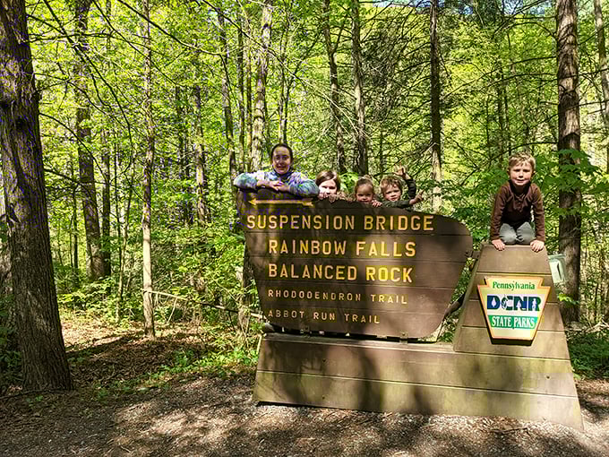 Future park rangers in training. These kids have discovered the original climbing wall—one crafted by Mother Nature herself.