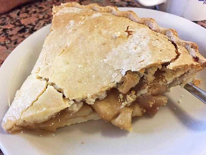 Apple pie so honest it could run for office. The flaky crust and cinnamon-kissed filling represent the American dream in dessert form.