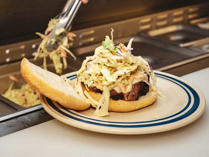 A sandwich piled high with coleslaw – because sometimes more really is more, especially with barbecue.