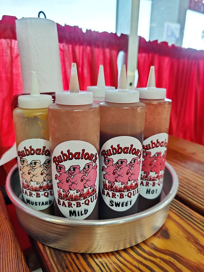 The sauce caddy—barbecue's version of a cocktail bar. From mustard to hot, each squeeze bottle holds liquid personality waiting to express itself.