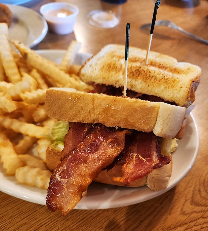 The BLT – where bacon doesn't just participate, it stars in the show. Those toothpicks aren't decoration; they're structural support for greatness.