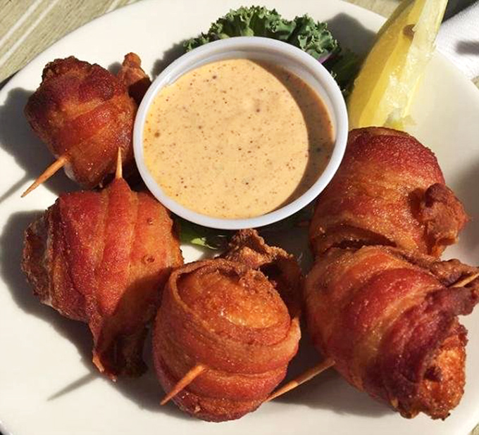 "Bacon-wrapped scallops – because sometimes the ocean's treasures need a little help from a pig to reach maximum deliciousness."