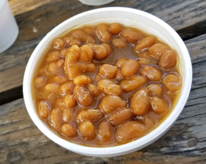 These aren't just baked beans – they're tiny flavor bombs swimming in a sauce that means business.
