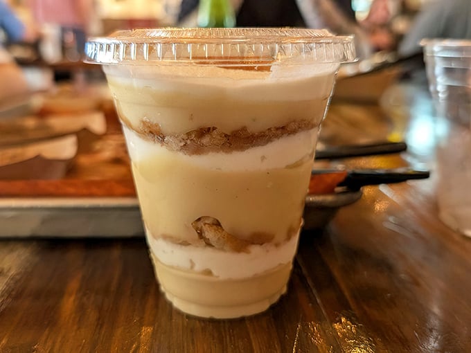 Banana pudding layered like a sweet geology experiment—vanilla wafers creating delicious sedimentary layers between creamy goodness.