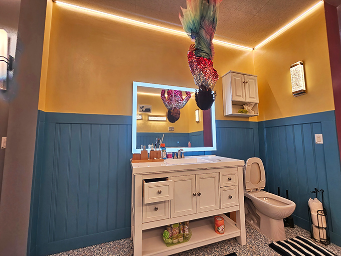 Bathroom mirror selfies just got a whole lot more interesting when you're hanging from the ceiling fixtures.