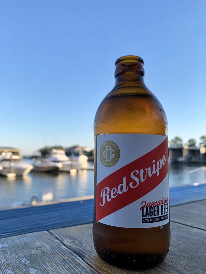 Nothing complements a waterfront meal like an ice-cold Red Stripe, especially when your "dining room" view includes boats gently bobbing nearby.