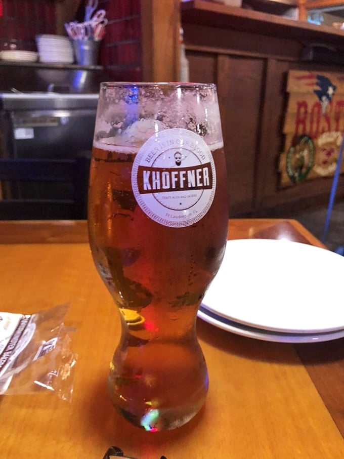 A cold beer with condensation beading down the glass—the perfect companion for seafood that tastes like it was swimming this morning.