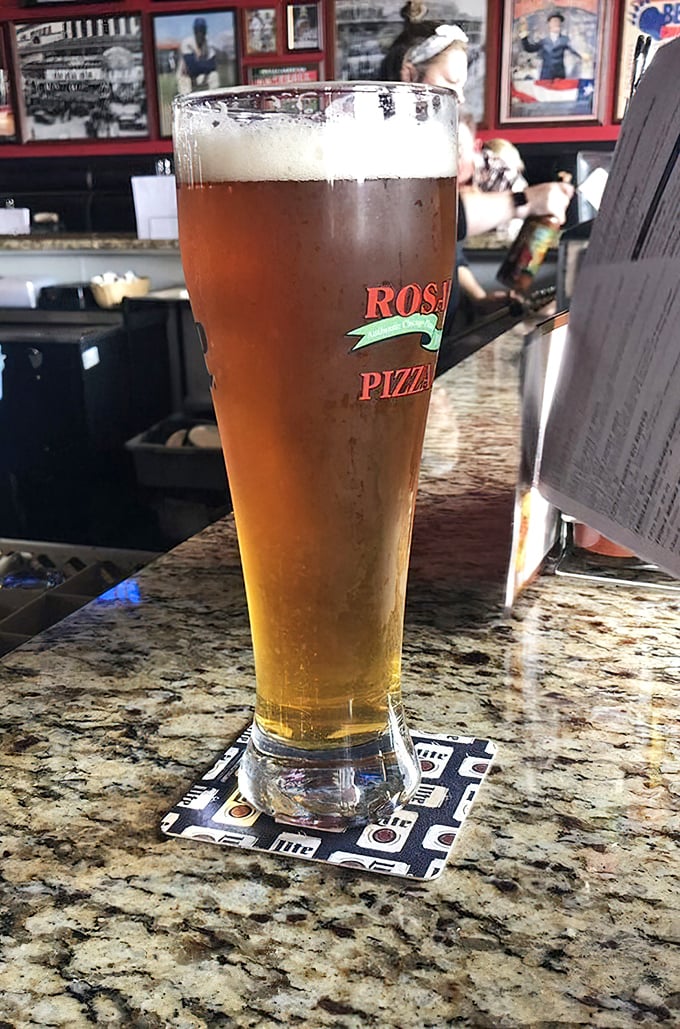 A tall, cold beer in a Rosati's glass – because pizza without beer is like Chicago without the Cubs. A perfect pairing since time immemorial.