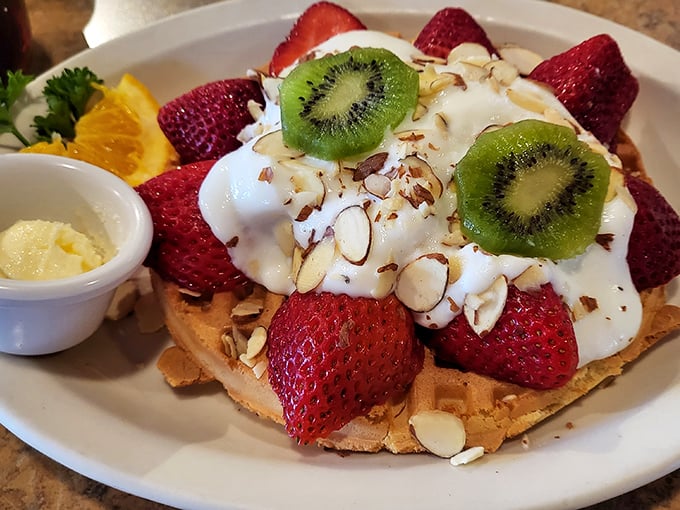 Whoever decided fresh fruit, whipped cream, and waffles belong together deserves a Nobel Prize in breakfast innovation.