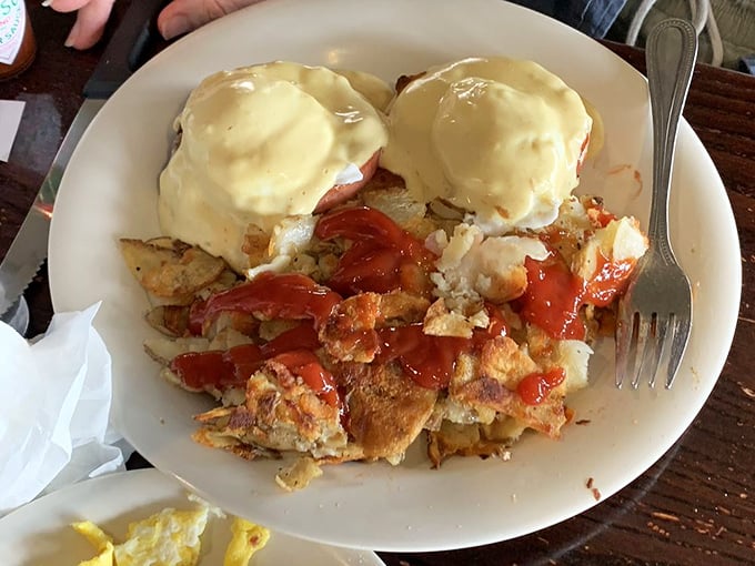 Eggs Benedict that would make the Pope himself convert to breakfast worship. Those perfectly poached eggs wear their hollandaise like royal robes.