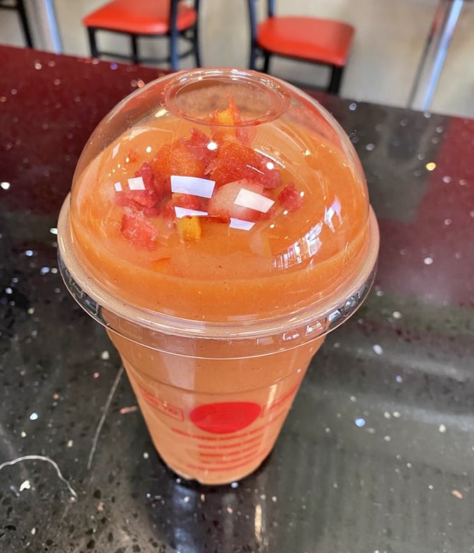 This isn't just a smoothie—it's summer captured in a cup. Vibrant, refreshing, and probably contains at least one of your daily fruit servings.