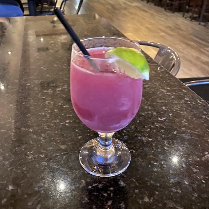 Even the cocktails at Tank House bring their A-game—this vibrant berry concoction is like summer in a glass, with a kick.