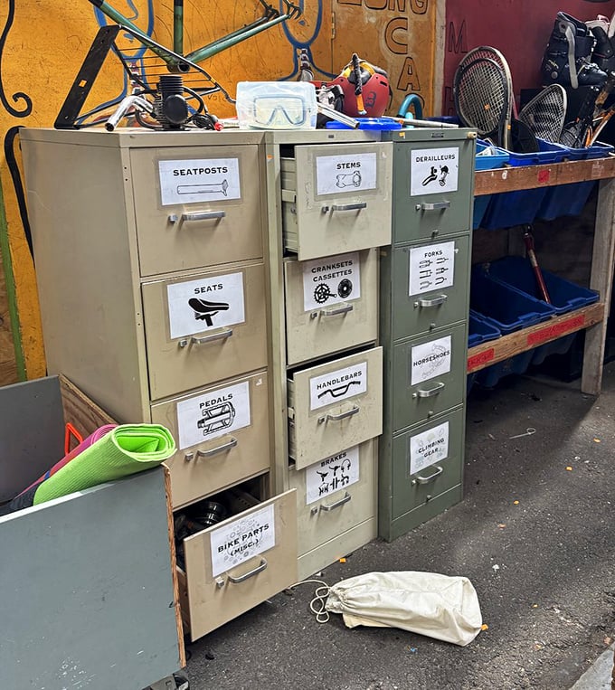 Organization meets obsession in these meticulously labeled bike part drawers. A cyclist's dream and a minimalist's nightmare.