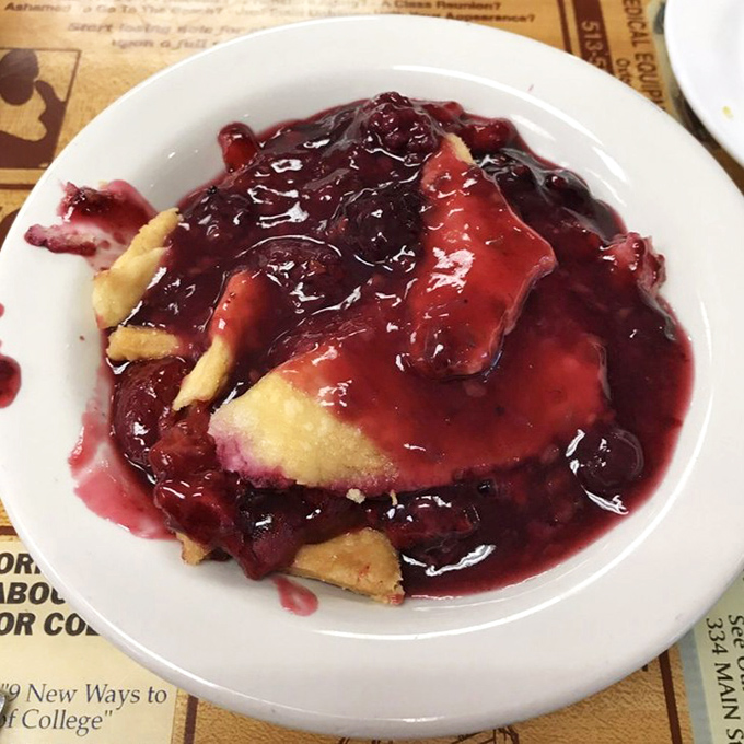 Berry cobbler that strikes the perfect balance between sweet and tart—the kind of dessert that makes you consider licking the plate when nobody's looking.