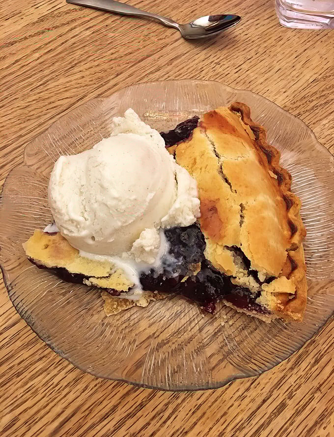 Pie that makes you understand why people used to cool these things on windowsills. That scoop of vanilla ice cream isn't optional—it's essential.