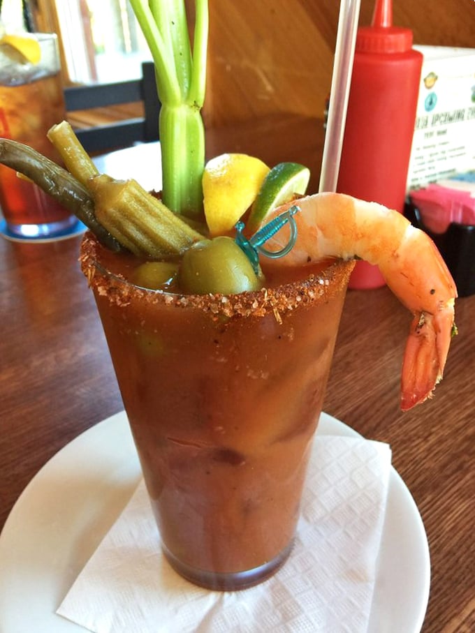 A Bloody Mary that's practically a meal unto itself. That shrimp perched on the rim isn't garnish—it's an appetizer with a view.