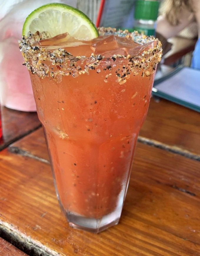 Their Bloody Mary doesn't just wake you up – it tells stories of ocean adventures with each spicy sip and that perfect lime garnish.