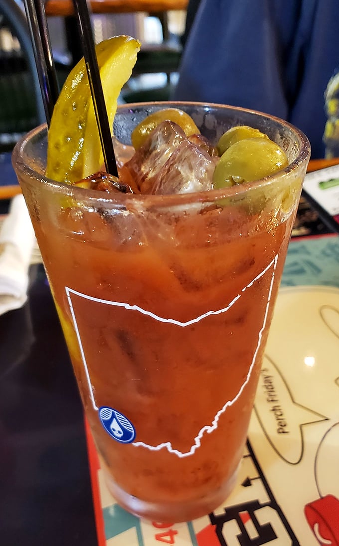 Their Bloody Mary comes in a glass showcasing Ohio's outline—because nothing says "local pride" like drinking your cocktail from a state-shaped vessel.