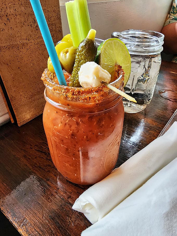 A Bloody Mary that's practically a meal unto itself—garnished with enough vegetables to count as your daily serving while the rim's spicy kick wakes up your taste buds.