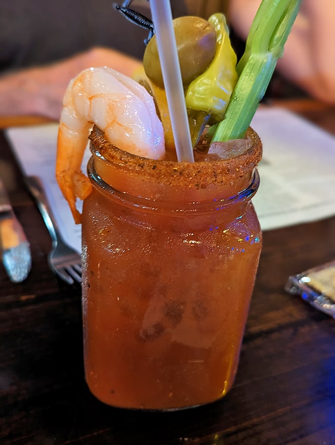 The Bloody Mary comes accessorized better than most people at brunch. That shrimp garnish is practically an appetizer.