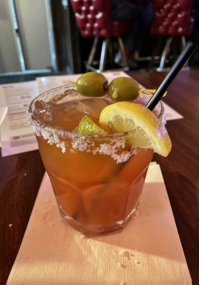 Their Bloody Mary comes dressed better than most people at brunch – garnished with olives, lemon, and enough spice to wake up your taste buds.