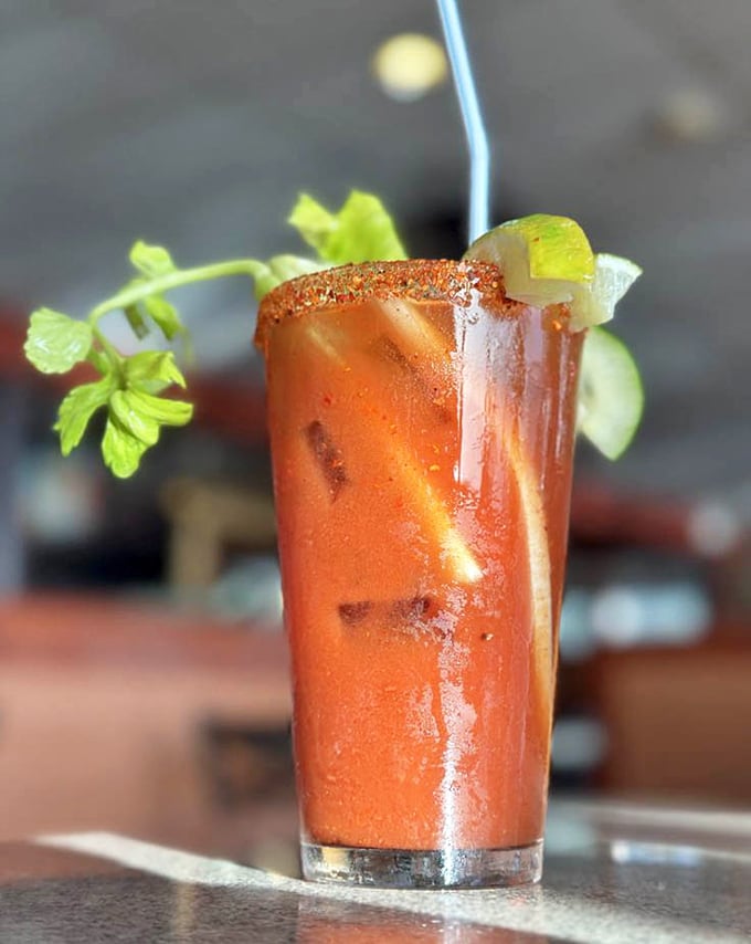 A Bloody Mary garnished with enough vegetation to count as a salad course – brunch multitasking at its finest.